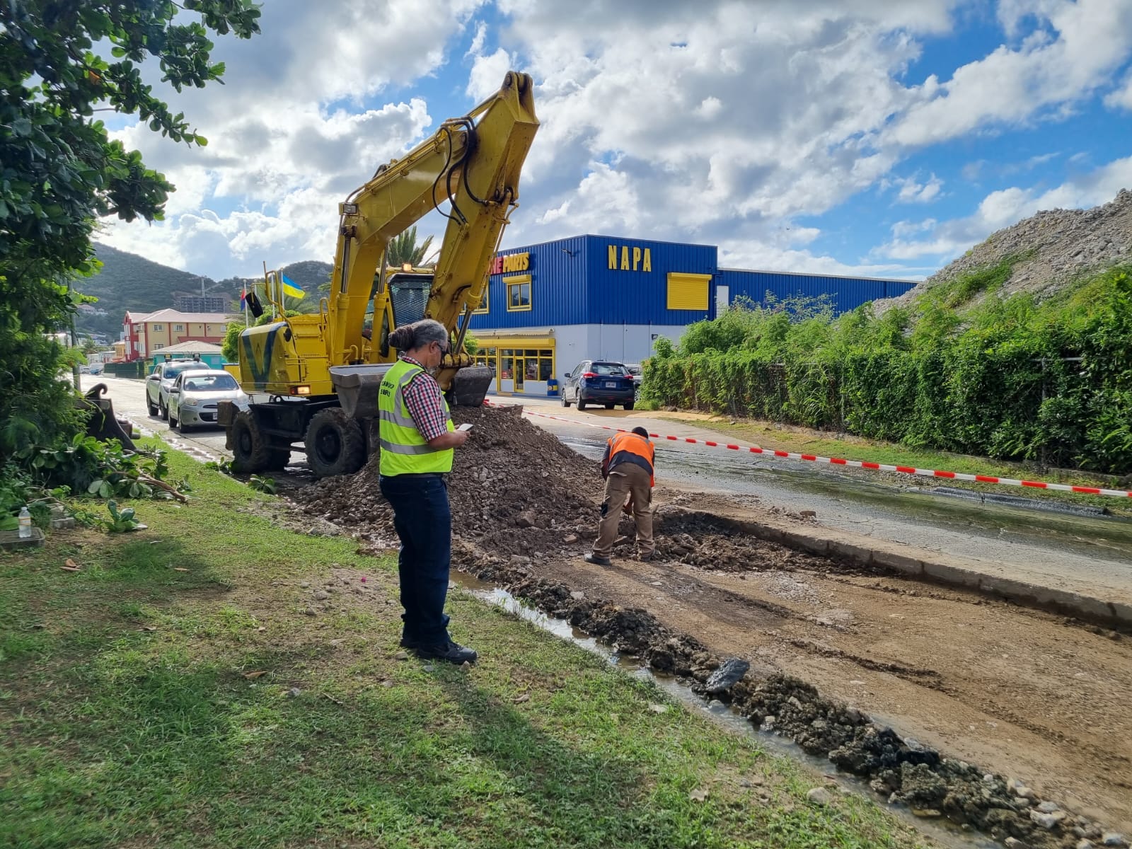 Minister of VROMI conduct emergency road works in Orange Grove